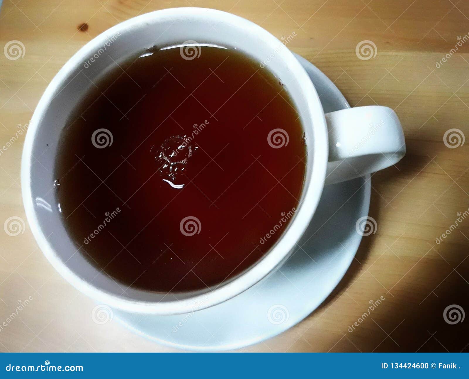 Tea on the table stock photo. Image of white, brown - 134424600