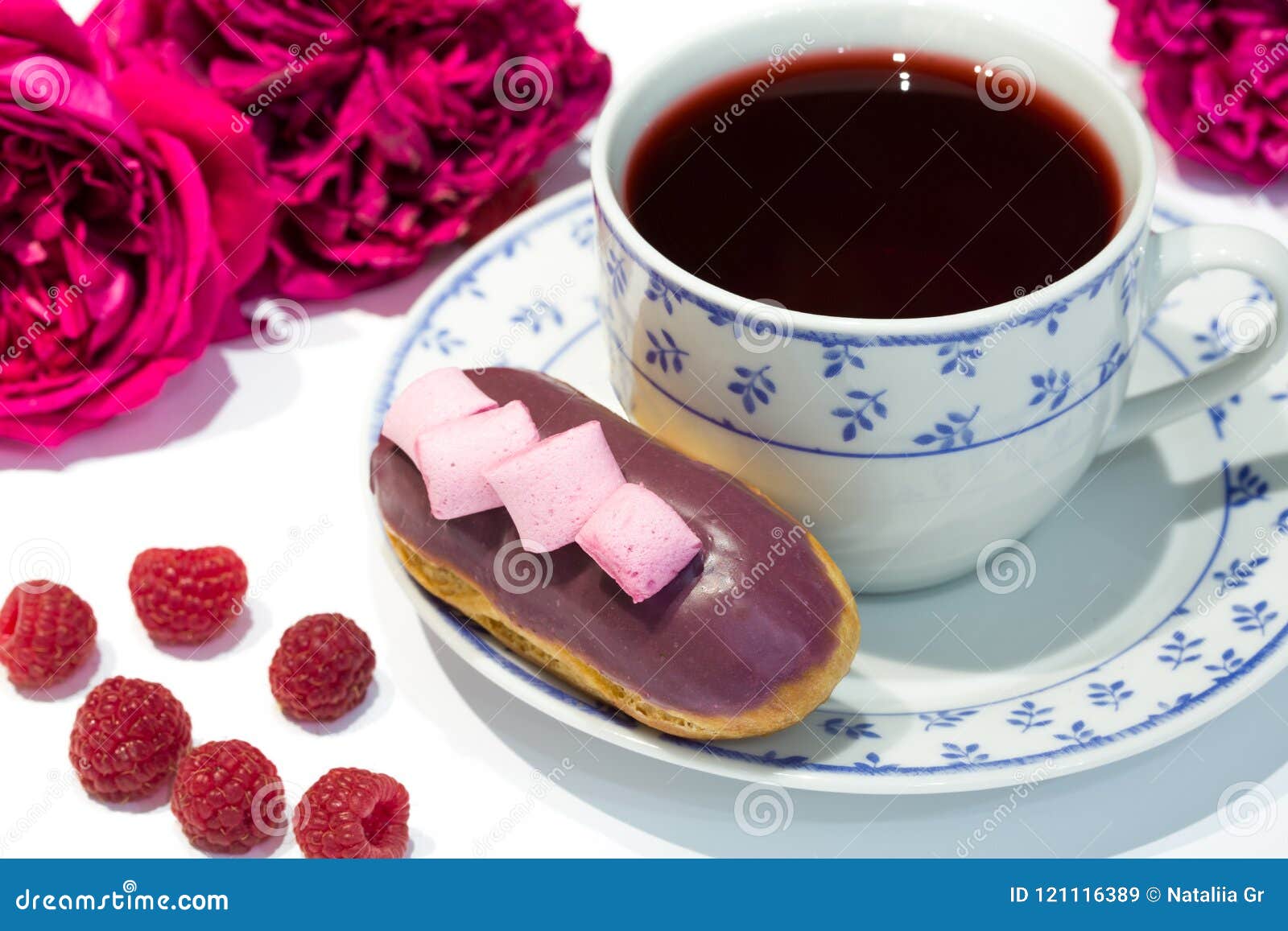 Tea Time with Blueberry Eclair and Raspberry, Interesting Design Stock ...