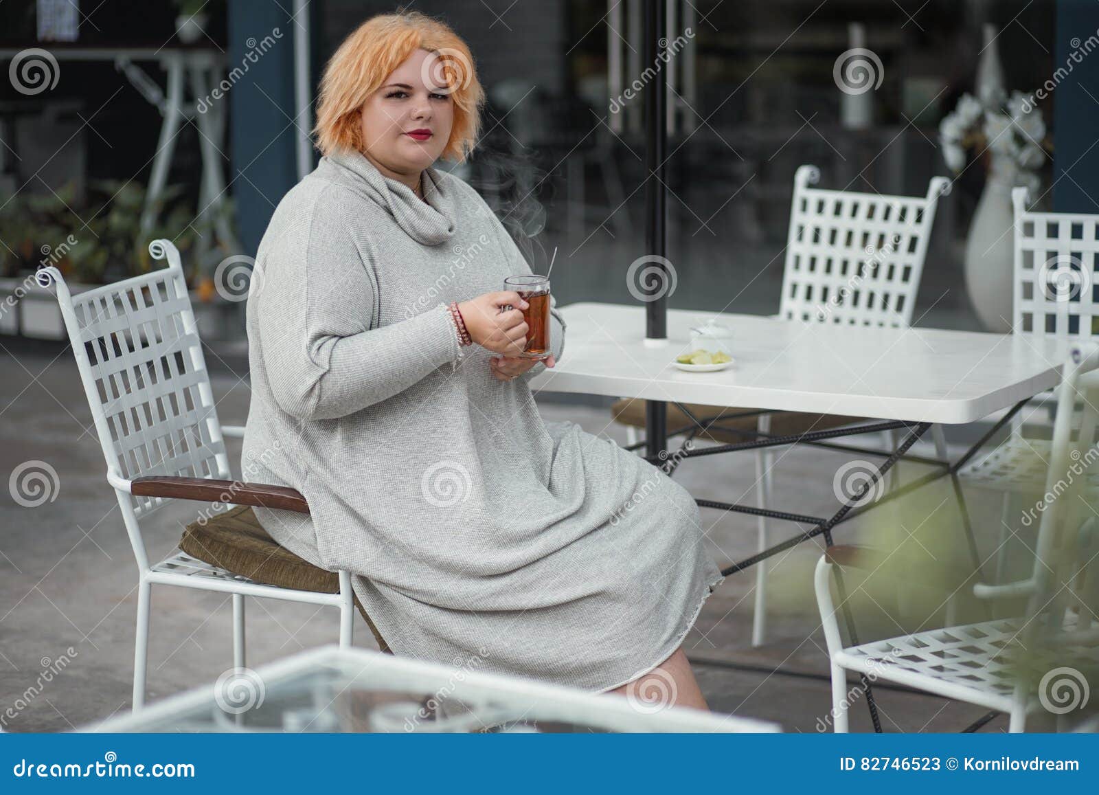 Tea time stock image. Image of holding, looking, positive - 82746523