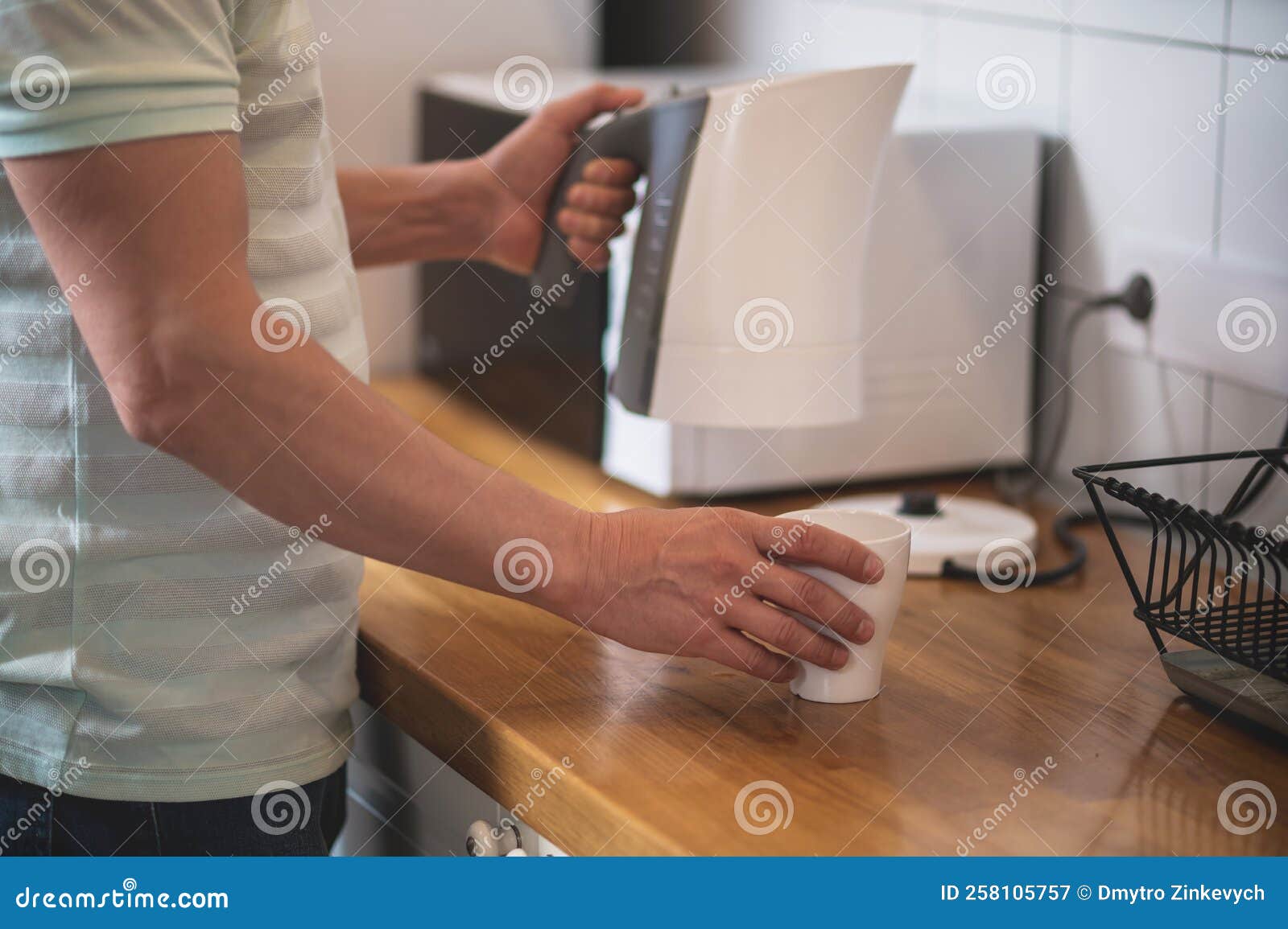 Close Up Picture of a Man Holding a Kettle Stock Image - Image of hand ...