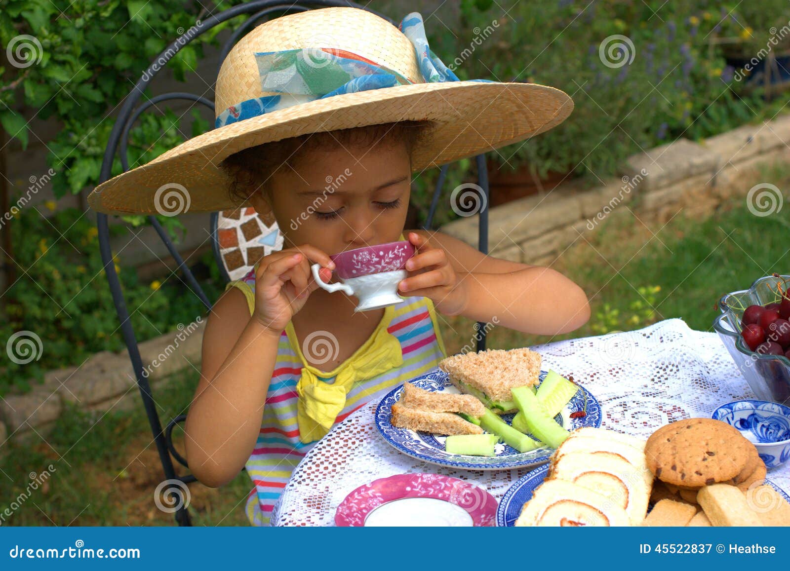 Tea-time in the garden stock image. Image of table, biscuits - 45522837