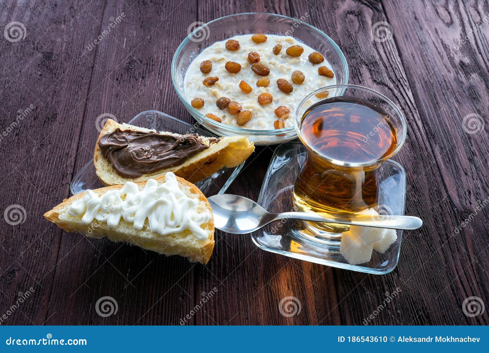 Tea and toast wooden table stock photo. Image of delicious - 186543610
