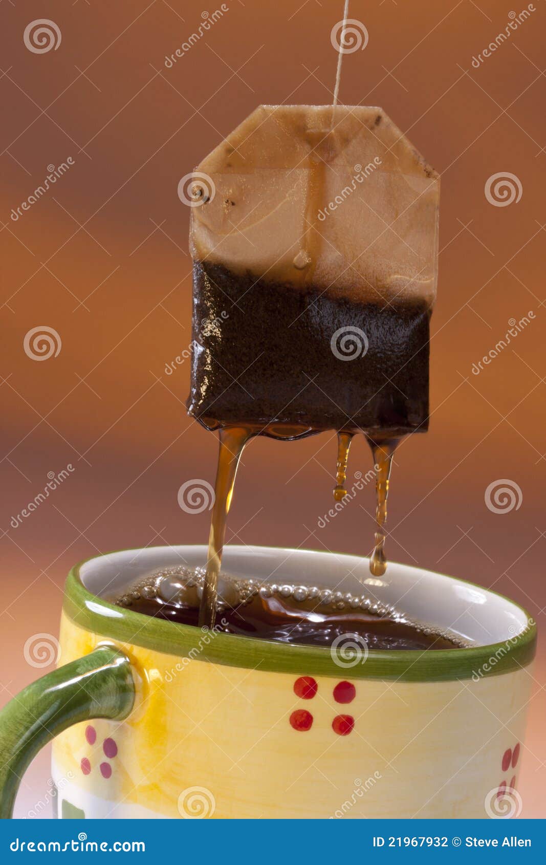 Tea - Using a Teabag stock photo. Image of teabags, droplet - 21967932