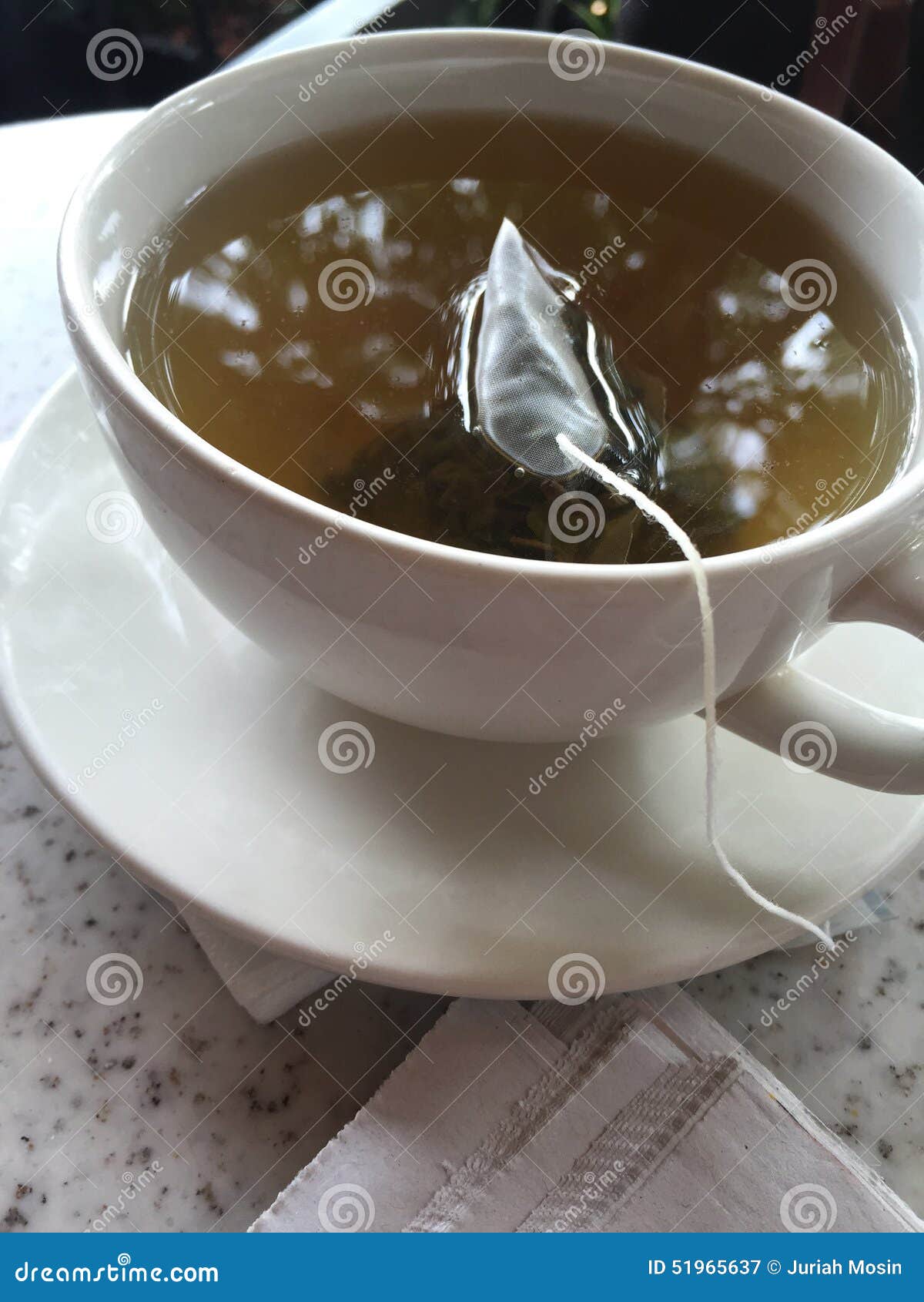 Teabag brewing in a teacup stock image. Image of fragrant - 51965637