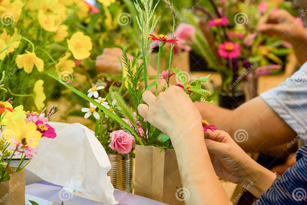 Teach flower arrangement stock photo. Image of persons - 96024190