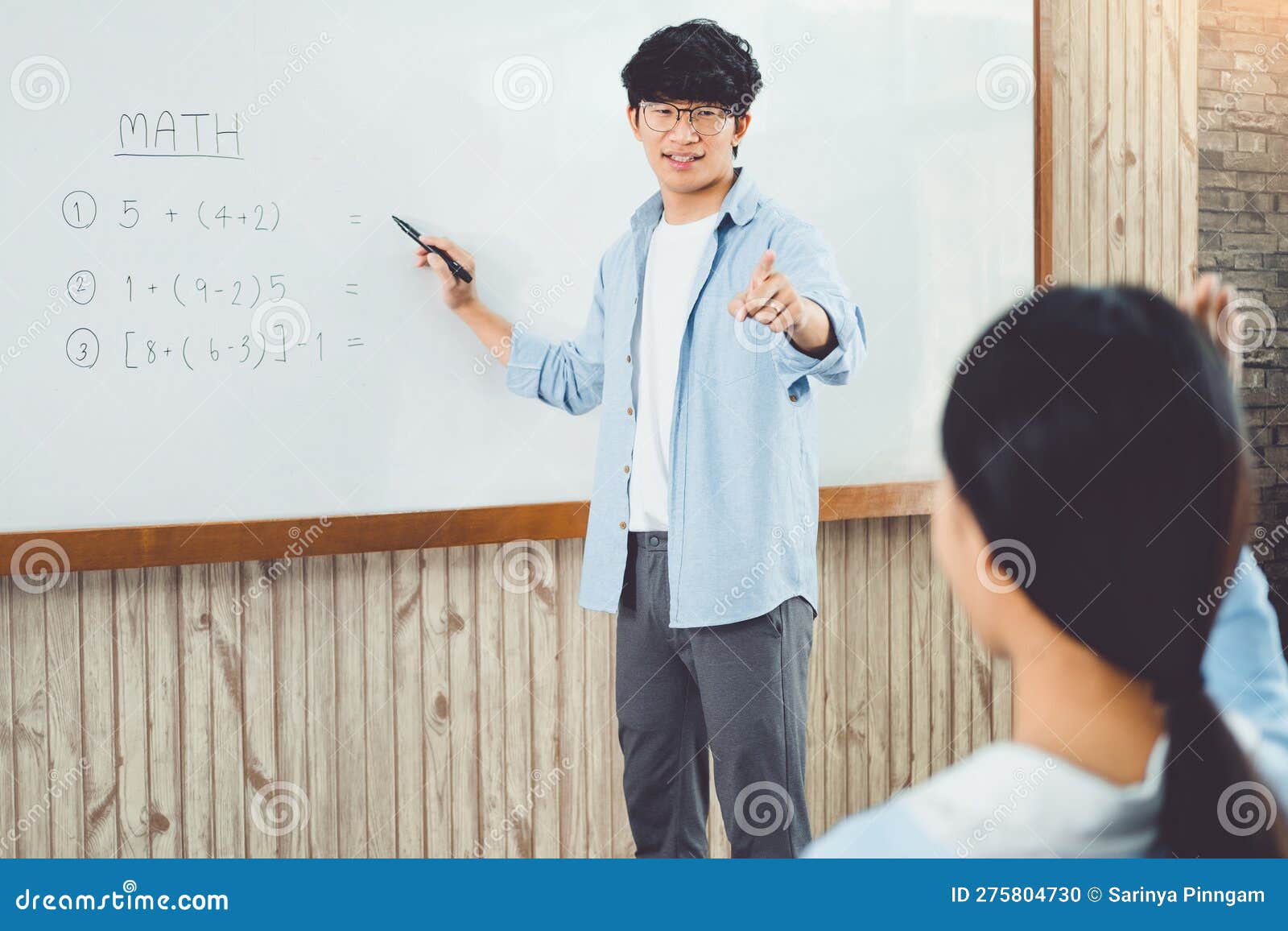 Teacher Addressing University Students in a Classroom Stock Photo ...