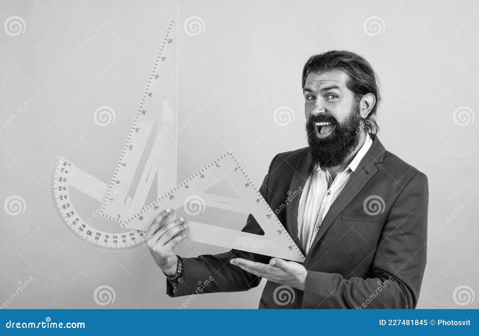 Teacher of Arithmetic with Happy Face Holding Protractor and Triangle ...