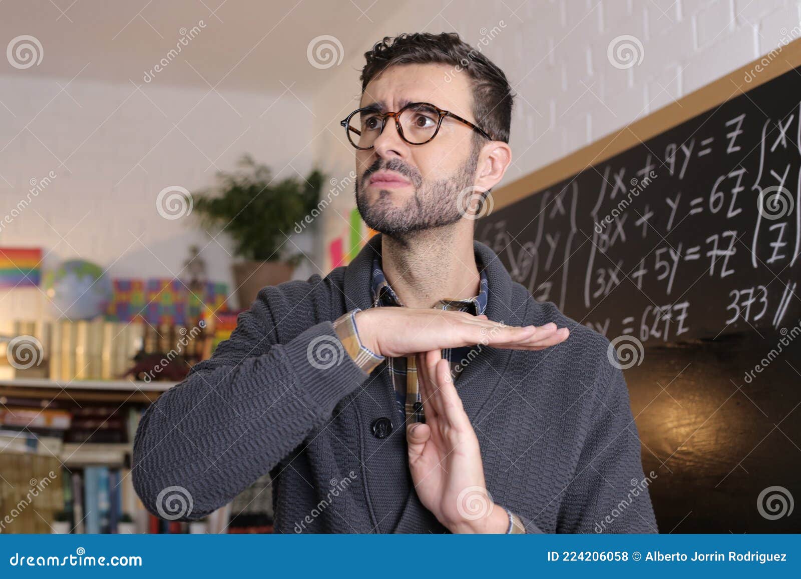 Teacher Asking for a Break with Time-out Hand Gesture Stock Photo ...