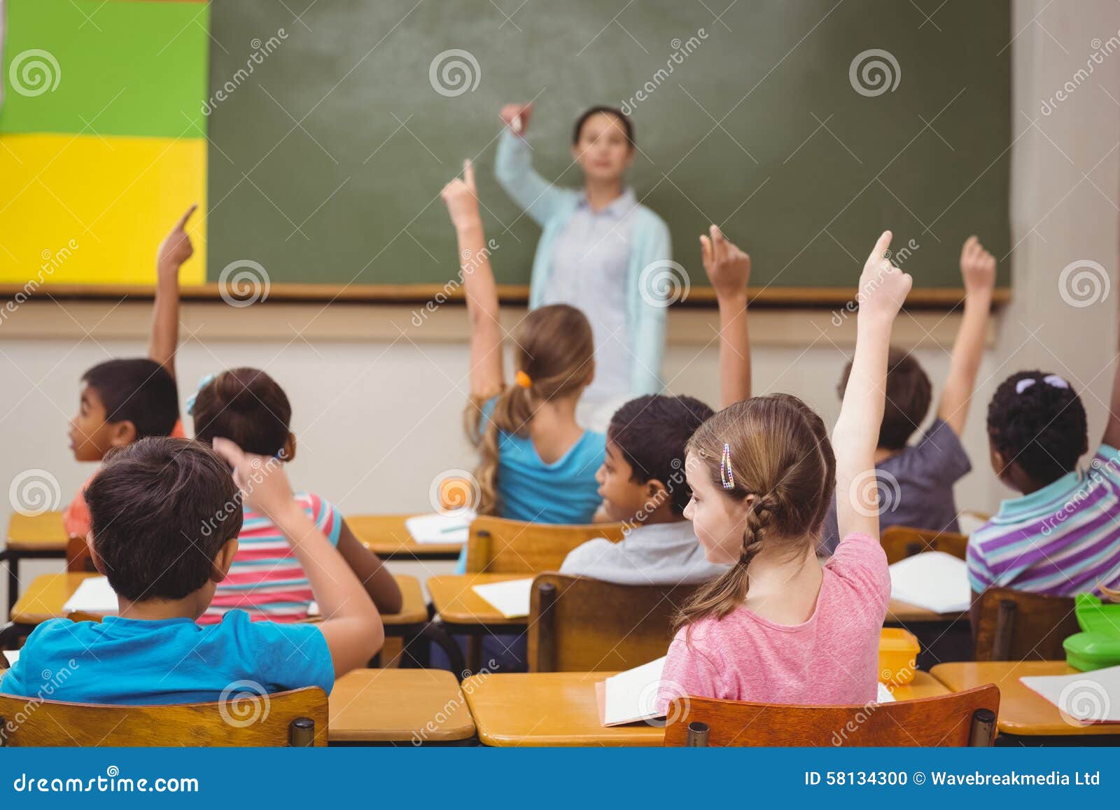 Teacher Asking a Question To Her Class Stock Photo - Image of chair ...