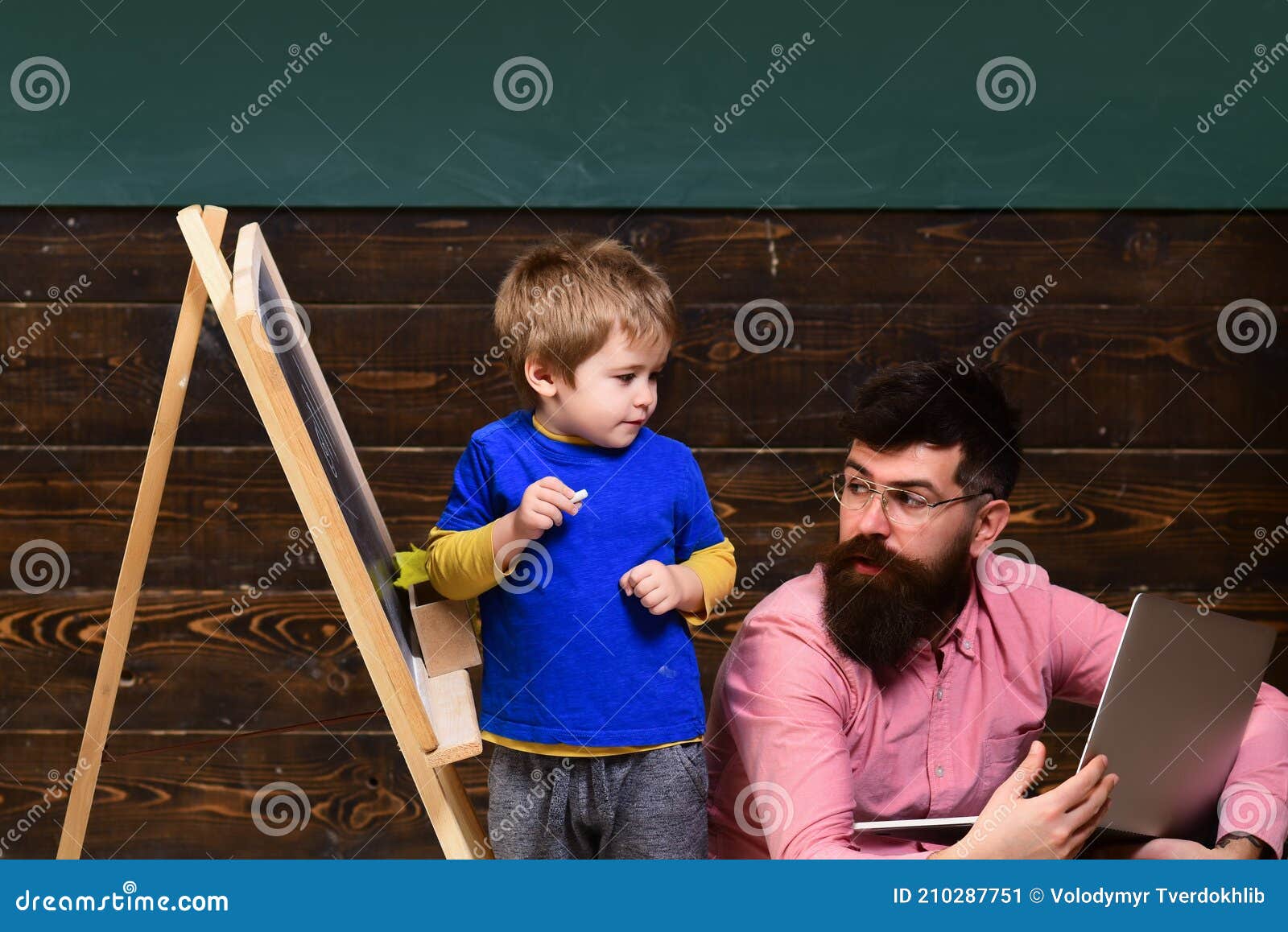 Teacher Checking Work of Pupil on Chalkboard. Kids Education Concept ...