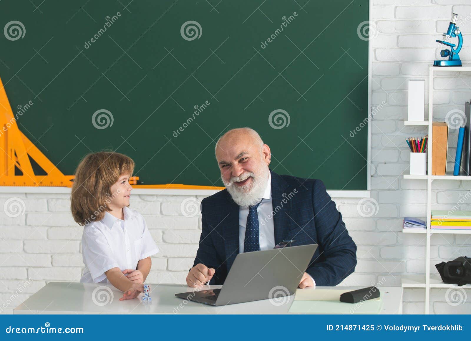 Teacher and Child in Classroom. Education Concept. School Learning ...