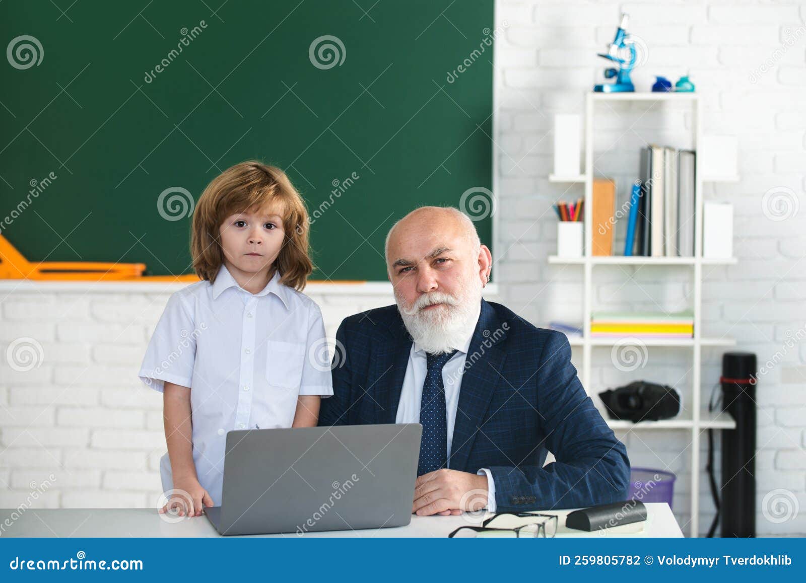 Teacher and Child in Classroom. Education Concept. School Learning ...