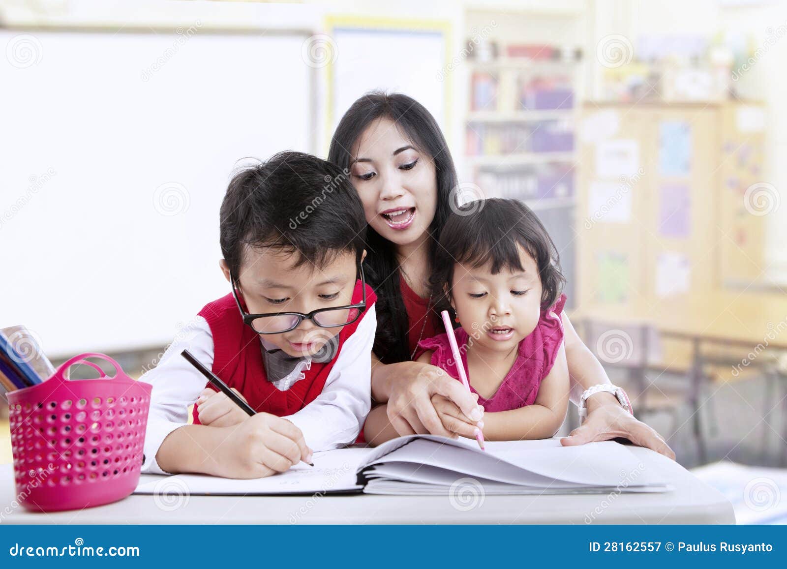 Teacher and Children Study in Classroom Stock Image - Image of class ...
