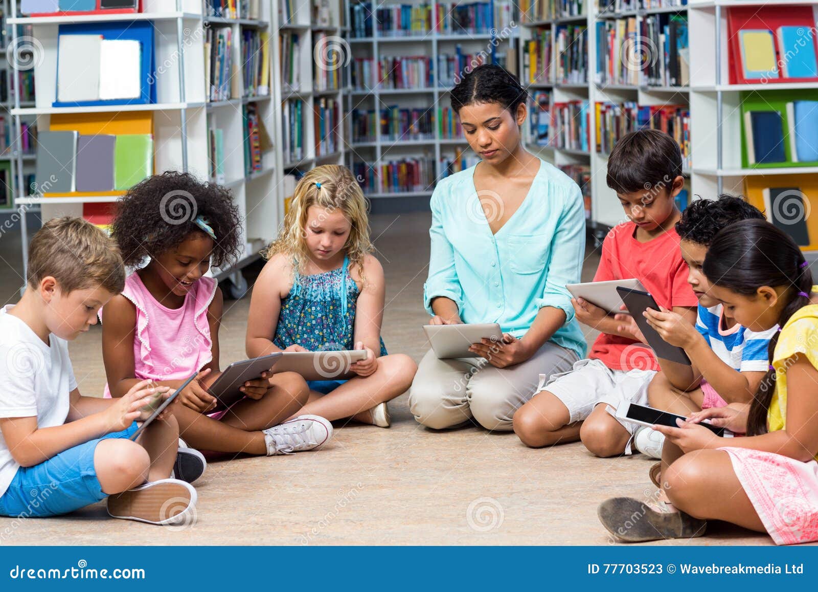 Teacher with Children Using Digital Tablet Stock Image - Image of ...