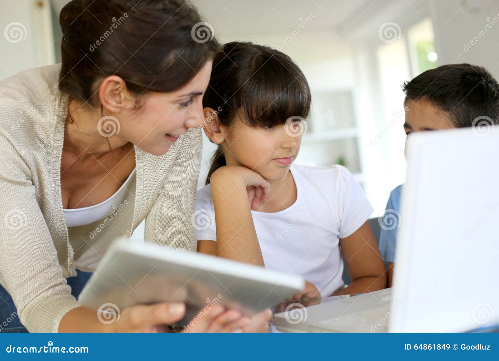 Teacher and Children Using Laptop and Tablet Stock Image - Image of ...