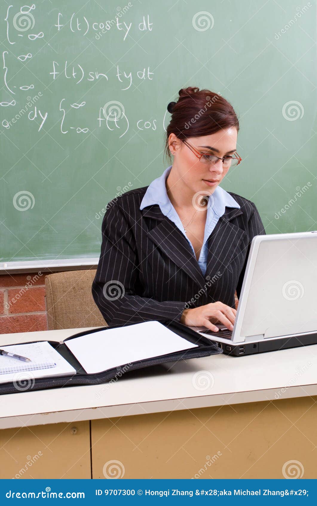 Teacher in classroom stock photo. Image of attractive - 9707300