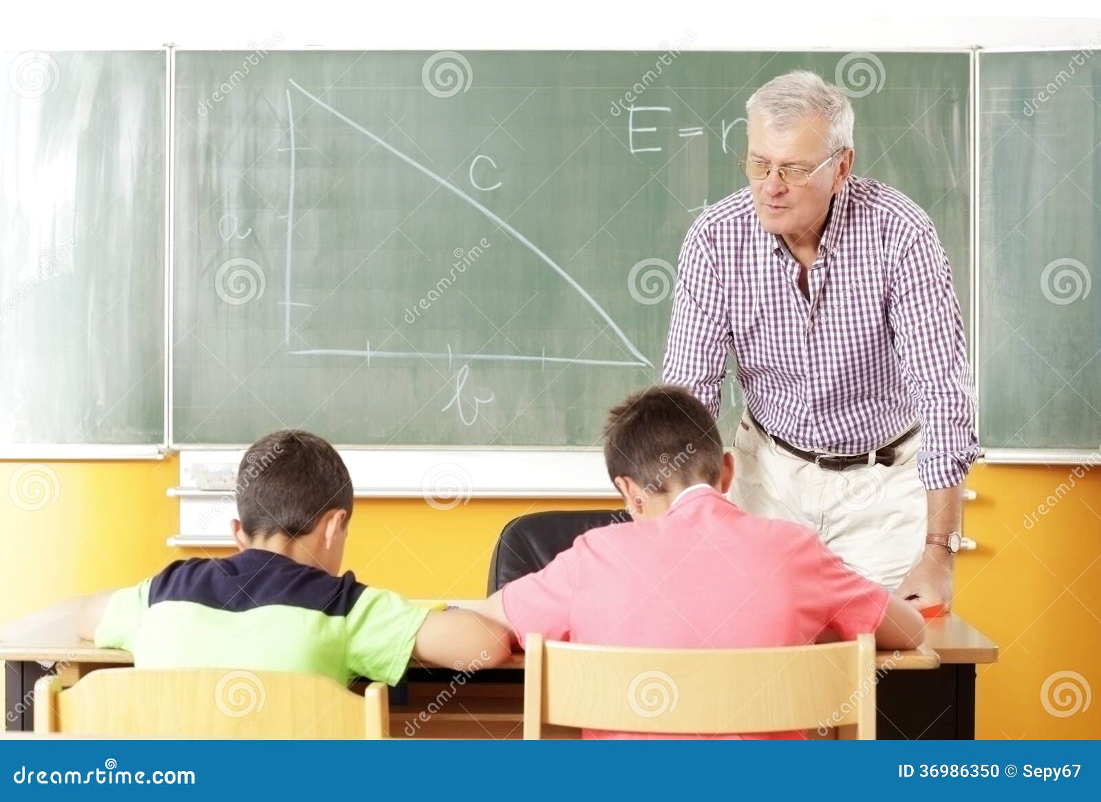 Teacher in Classroom stock photo. Image of blackboard - 36986350