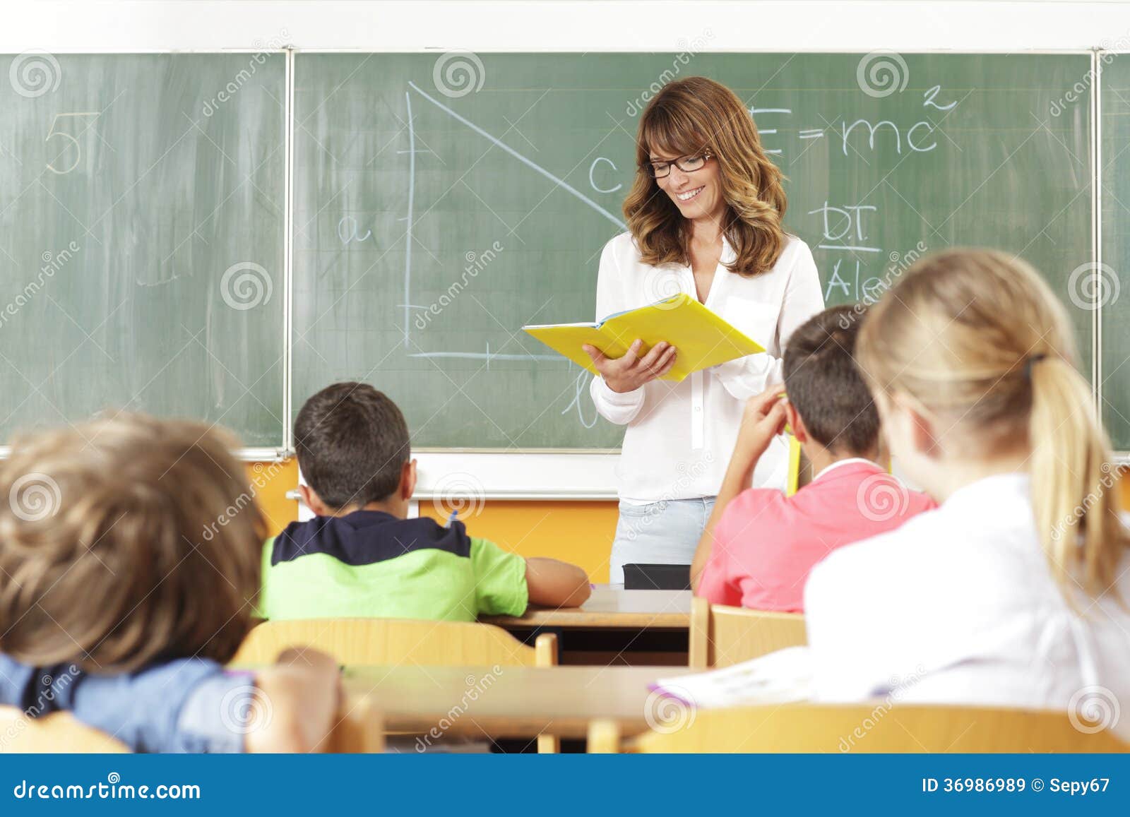 Teacher in Classroom stock image. Image of boys, little - 36986989