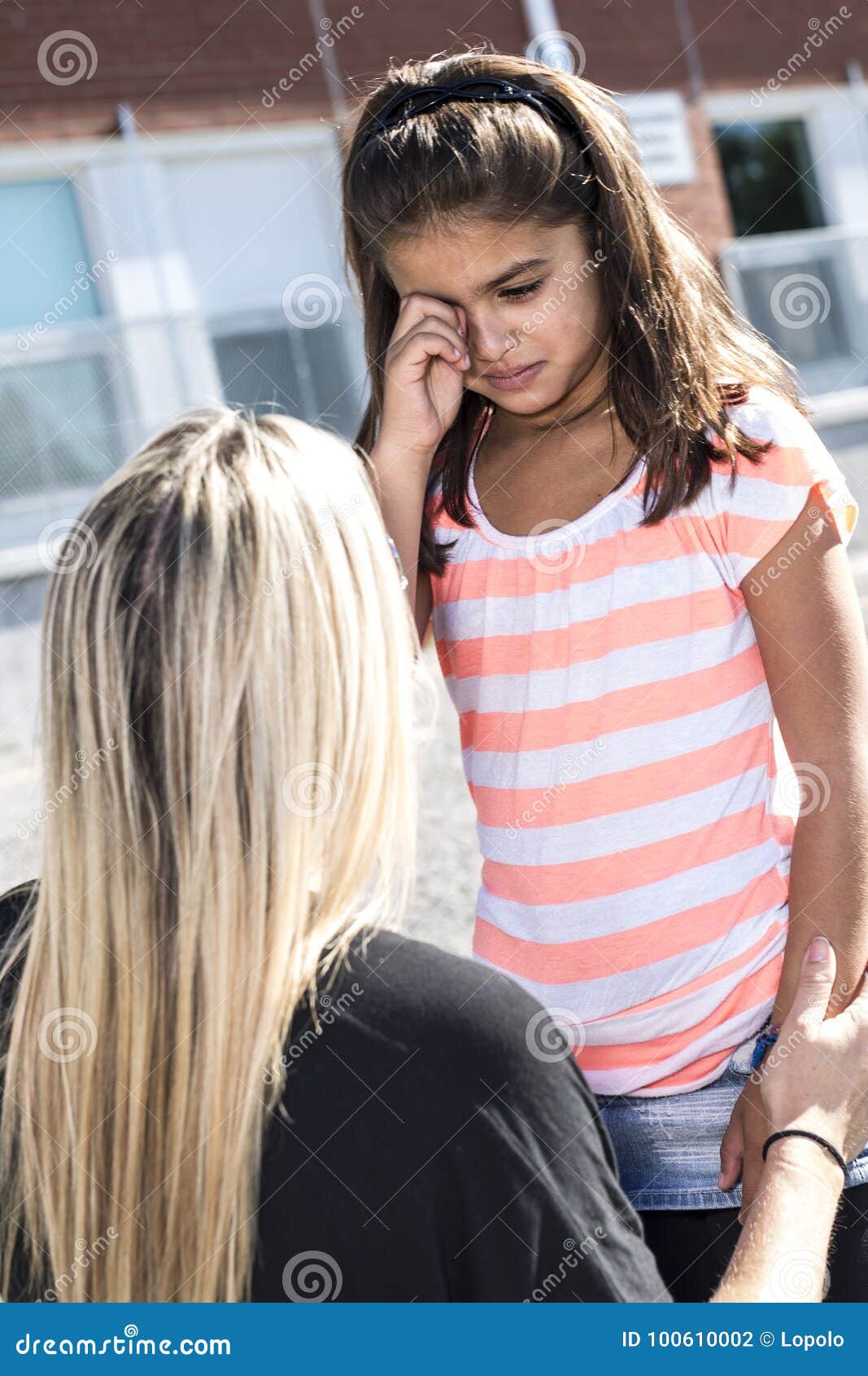 Teacher Consoling a Girl on Schoolyards Stock Photo - Image of crying ...
