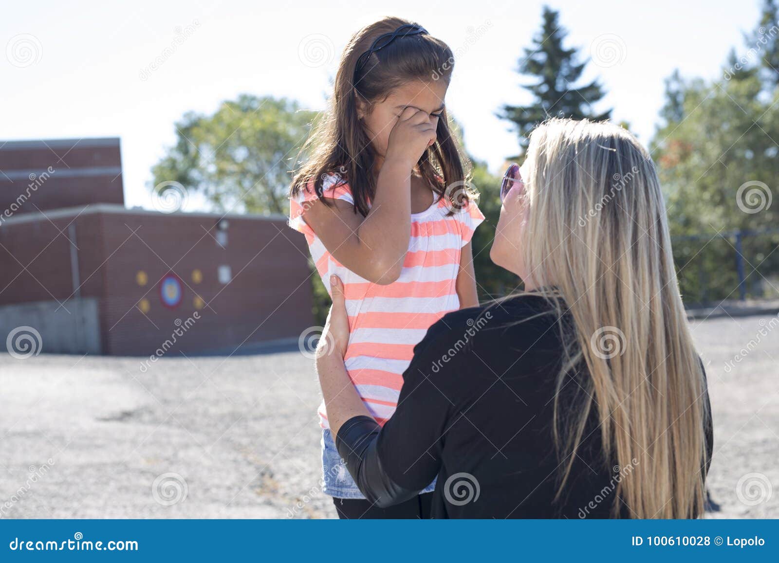 Teacher Consoling a Girl on Schoolyards Stock Photo - Image of problem ...