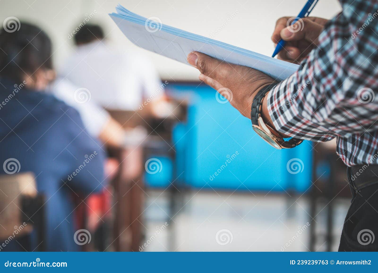 The Teacher Controls the Exam Room for Students To Take the Exam in the ...