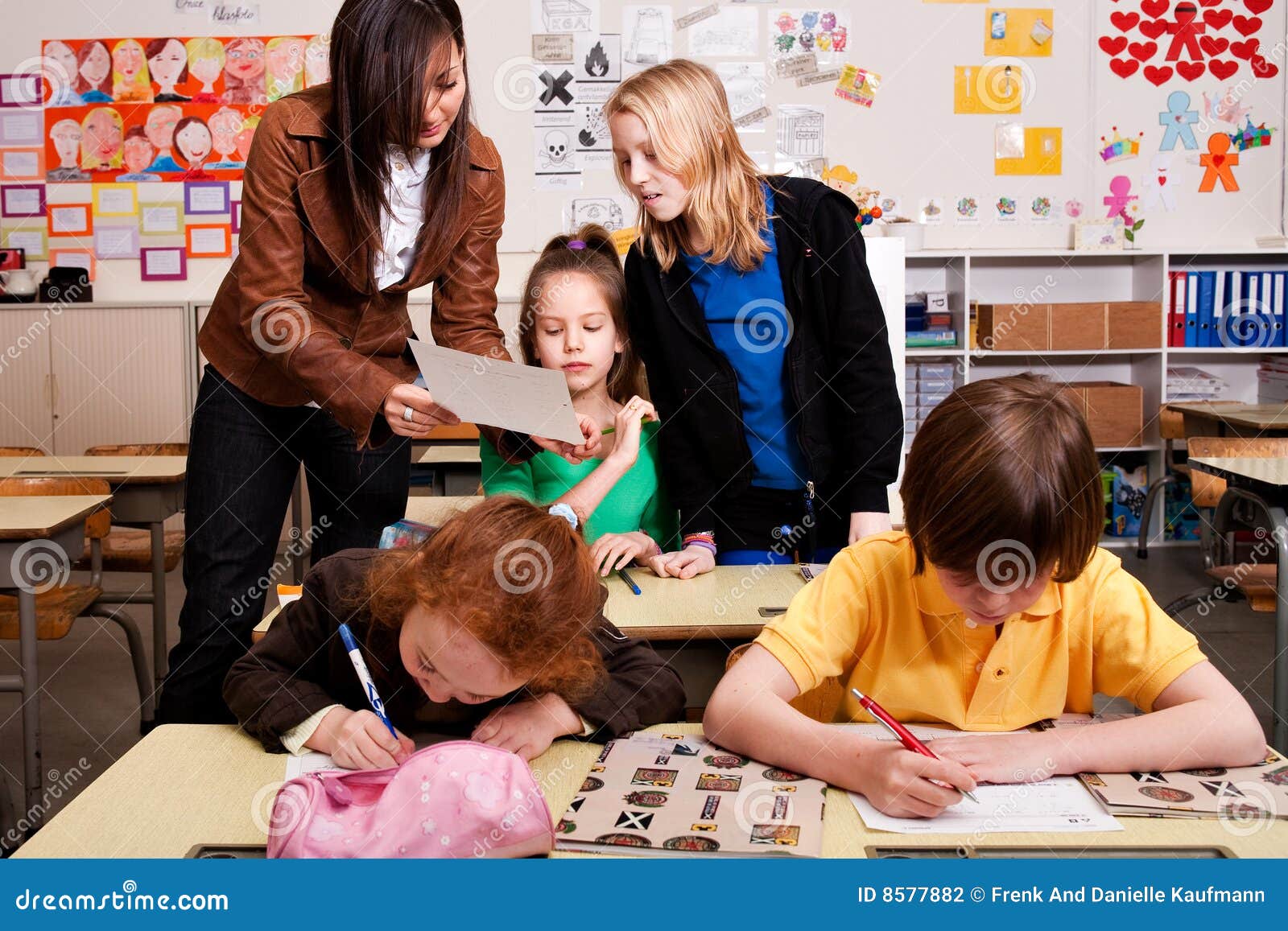 Teacher is Correcting the Piece of Paper Stock Photo - Image of ...