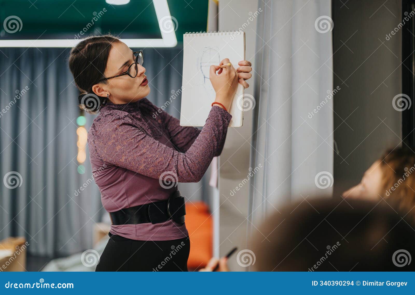 Teacher Demonstrating Drawing Technique To Engaged Students in ...