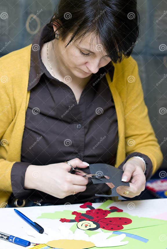 Teacher doing cutouts stock photo. Image of prepares, cutouts - 8541896