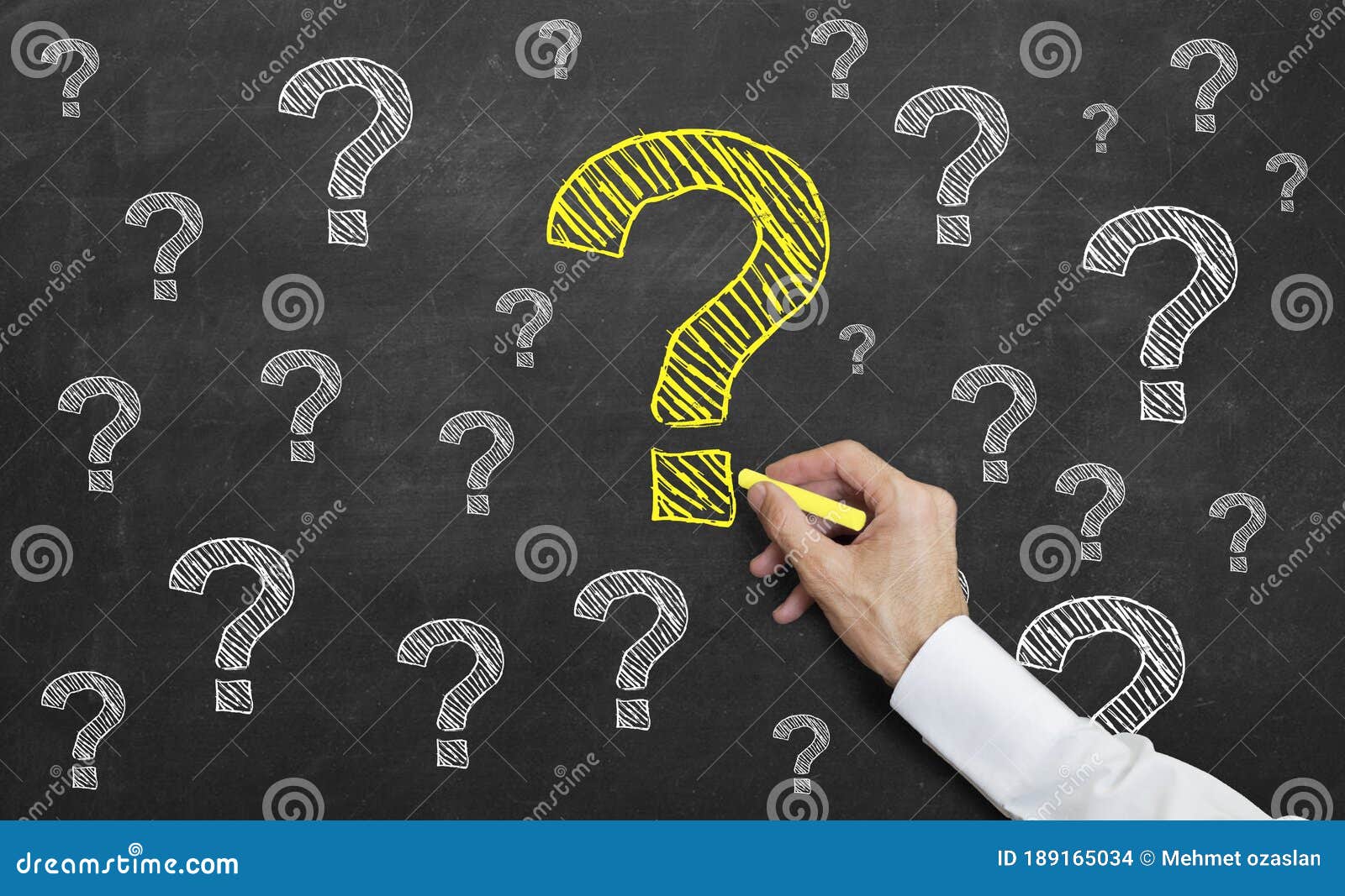Teacher Drawing a Yelow Question Mark on Blackboard Stock Photo - Image ...