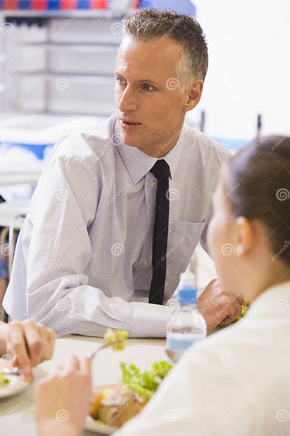 A Teacher Eating Lunch with His Students Stock Image - Image of dinner ...