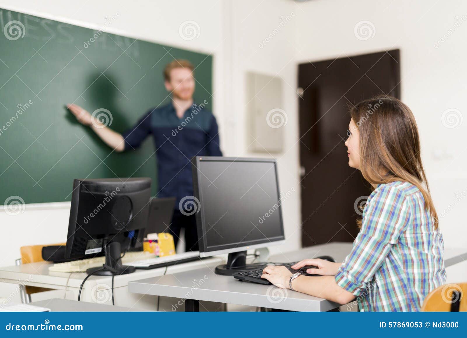 Teacher Educating a Pupil in a Classroom Stock Image - Image of ...