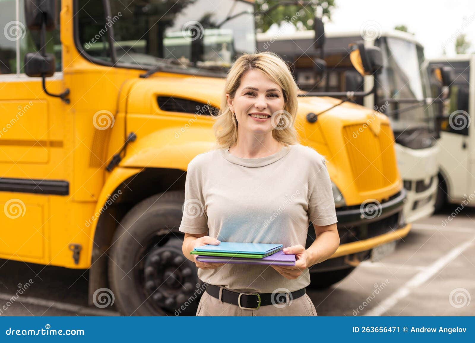 Teacher of Elementary School Near the School Bus Stock Image - Image of ...