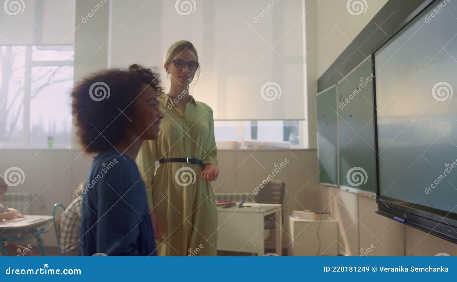 Teacher Explaining Lesson. Girl Drawing Task on Interactive Digital ...