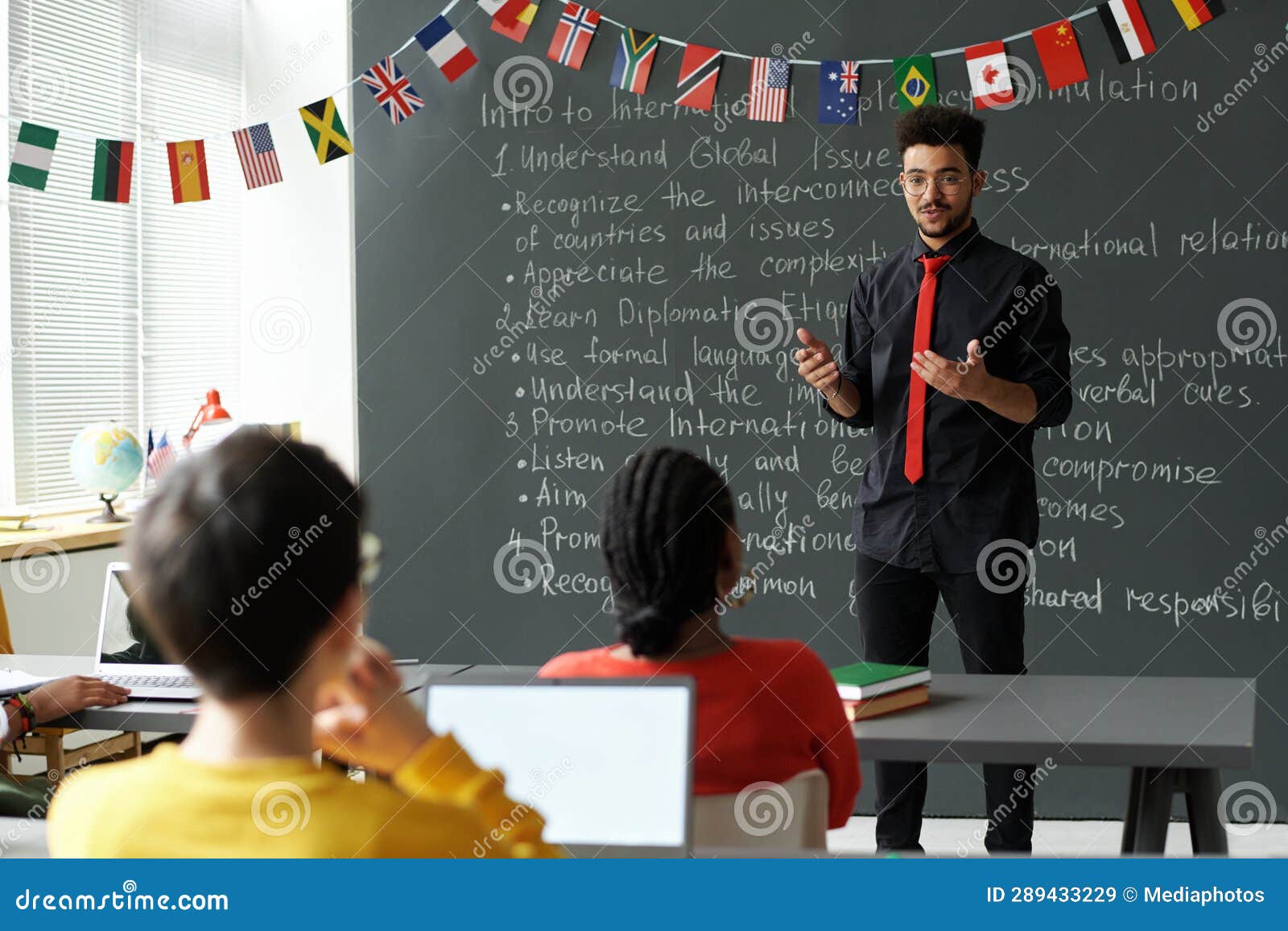 Teacher Explaining Material in the Classroom Stock Image - Image of ...