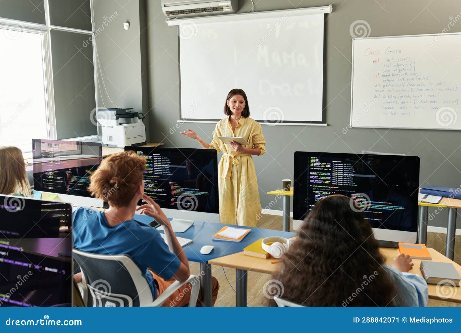 Teacher Explaining Material To Students at Lesson Stock Image - Image ...