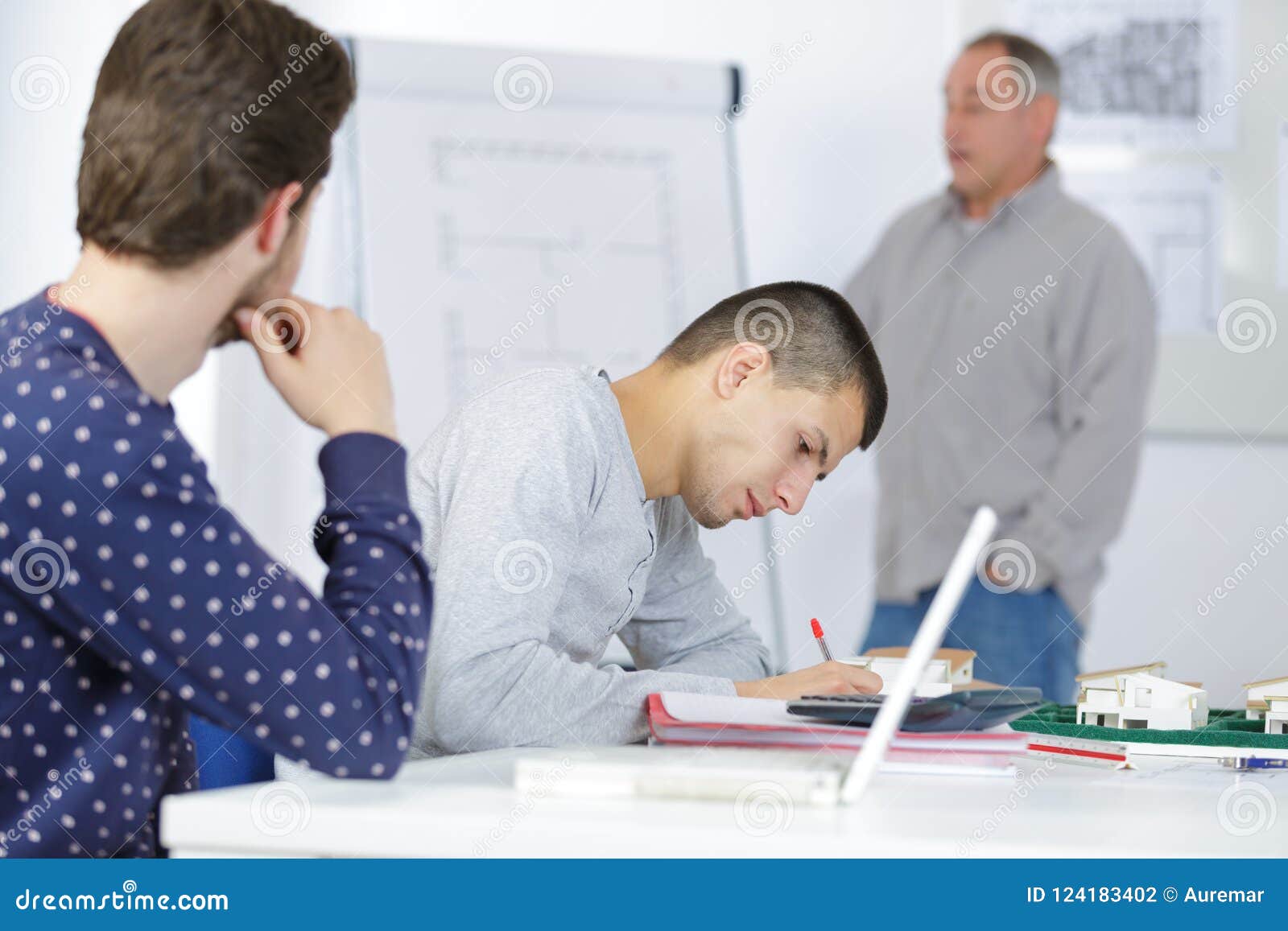 Teacher Explaining Something To Students Stock Photo - Image of ...
