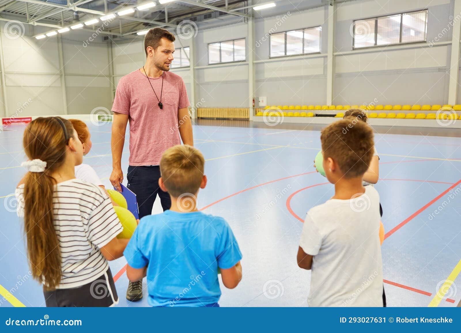 Teacher Explaining Students Standing in Gym Class Stock Image - Image ...