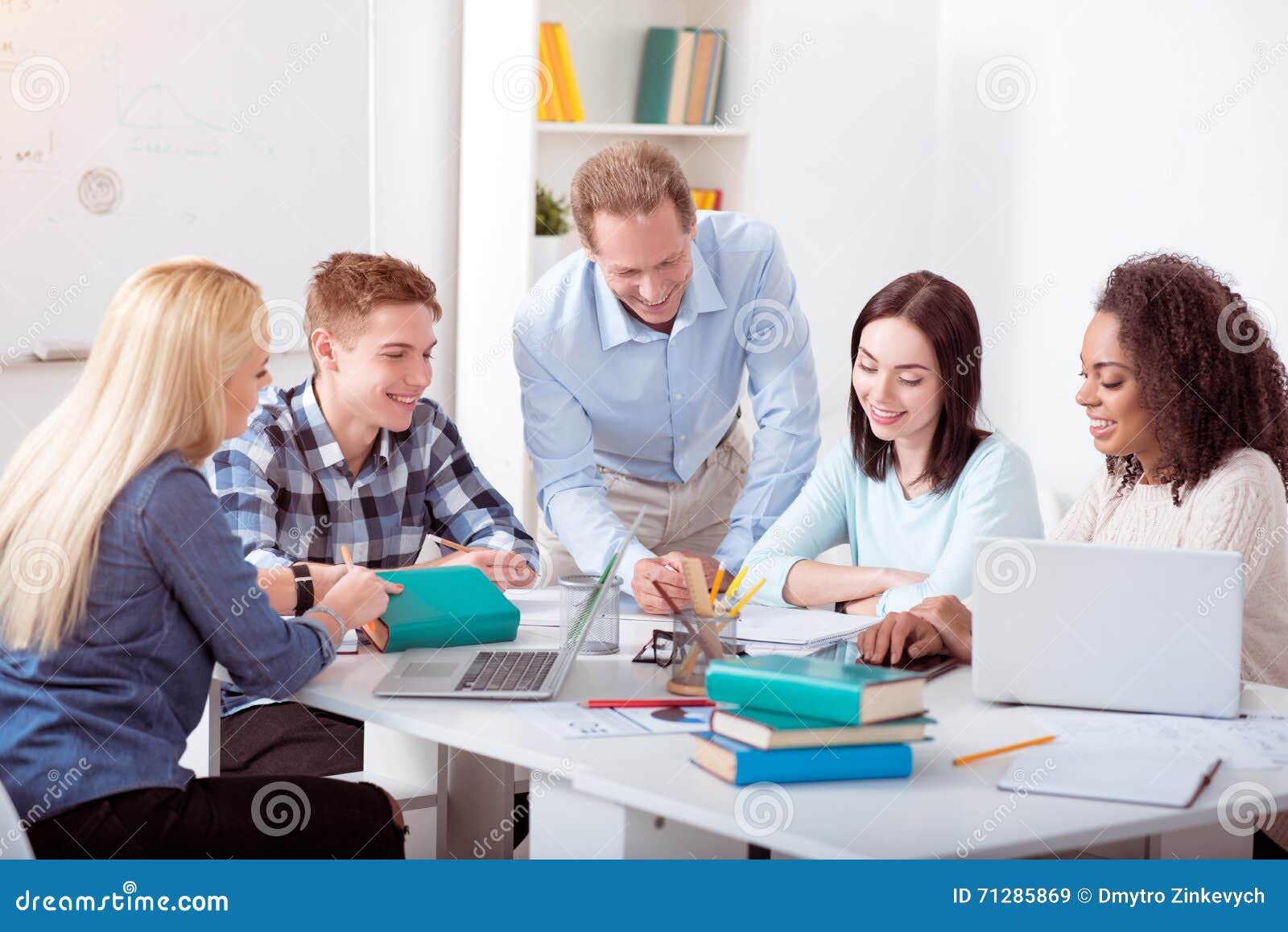 Teacher Explaining To His Students Stock Image - Image of coach ...