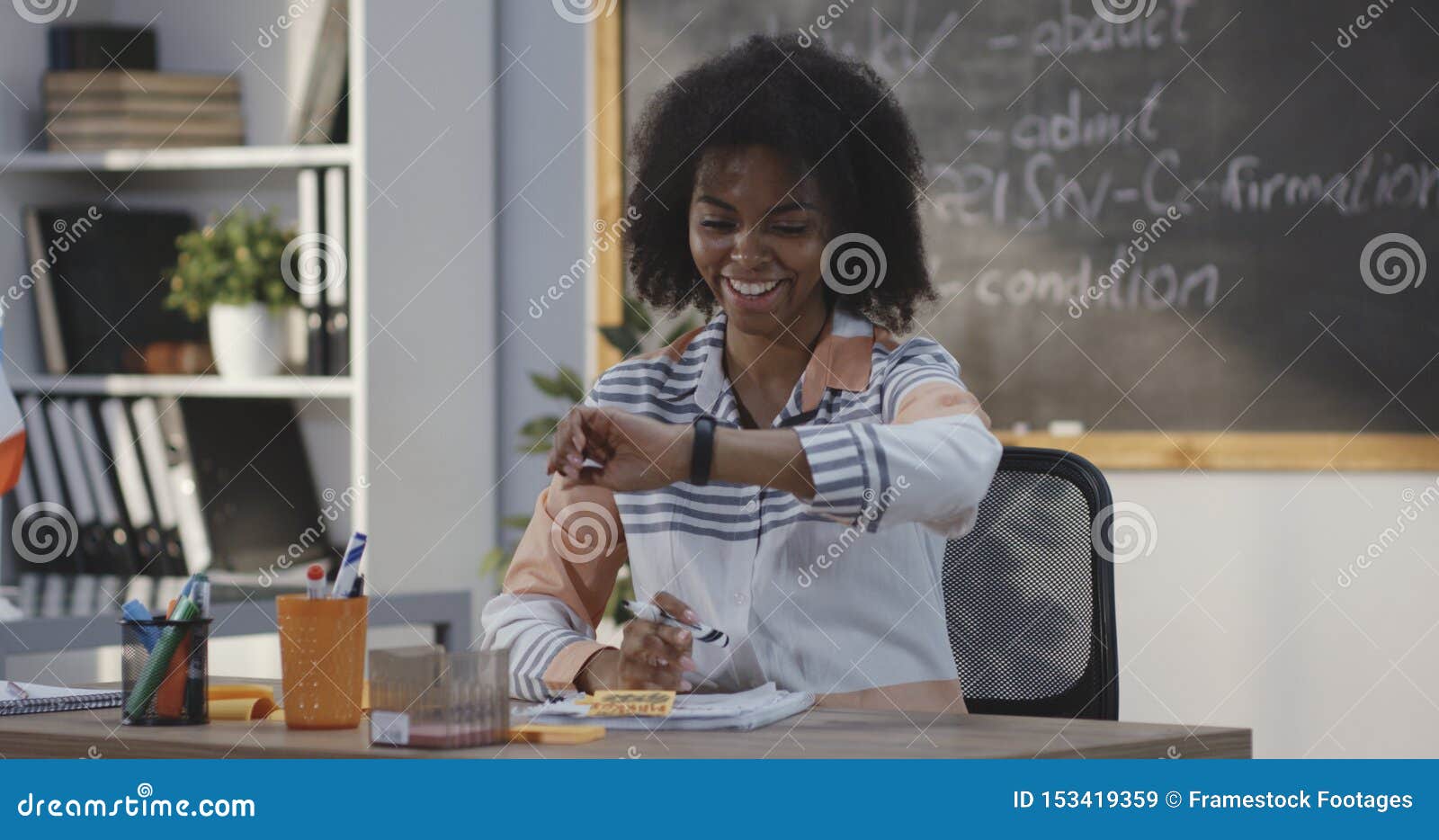 Teacher Explaining To Student in a Classroom Stock Image - Image of ...