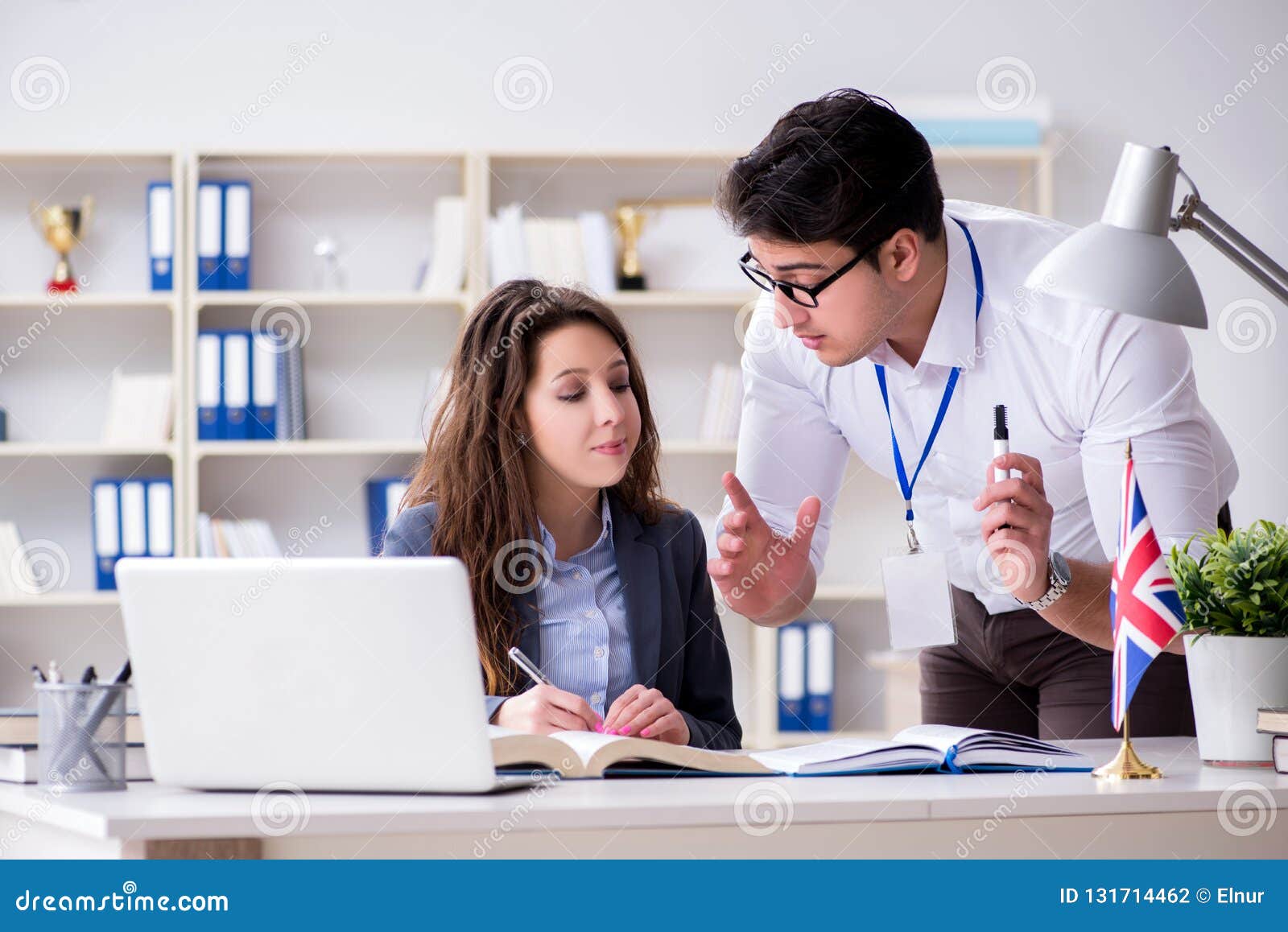The Teacher Explaining To Student at Language Training Stock Photo ...