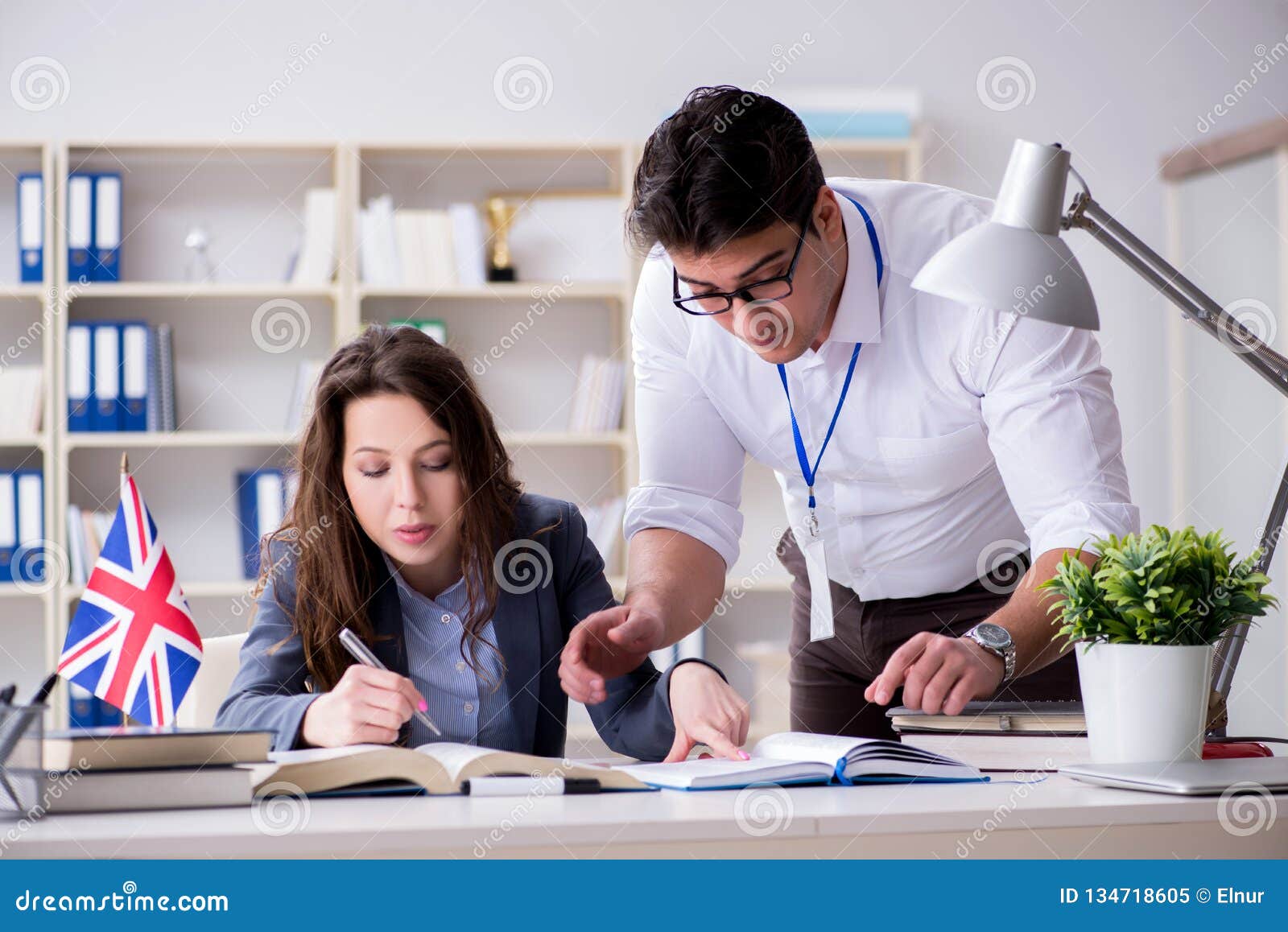 The Teacher Explaining To Student at Language Training Stock Image ...