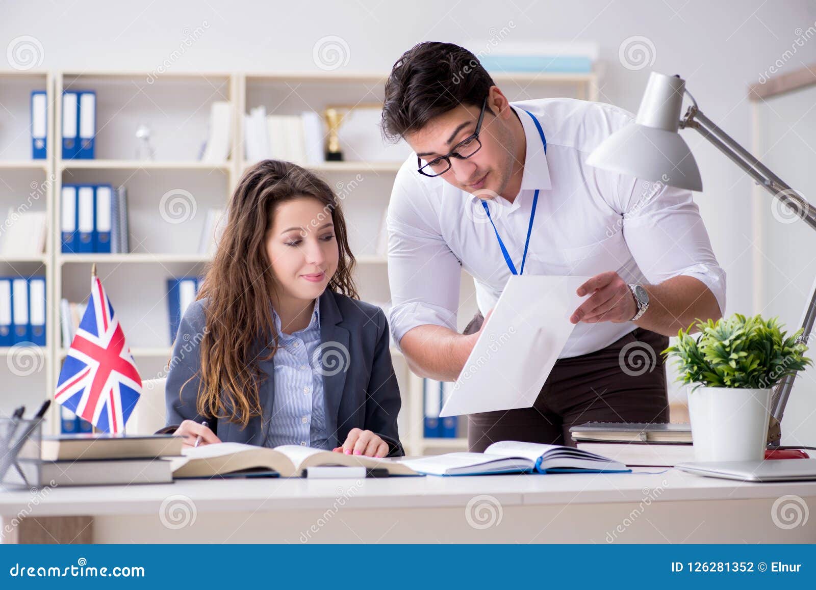 The Teacher Explaining To Student at Language Training Stock Photo ...