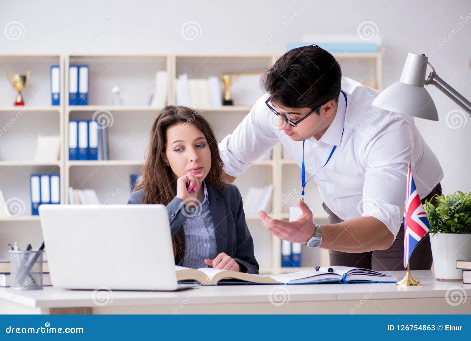 The Teacher Explaining To Student at Language Training Stock Image ...