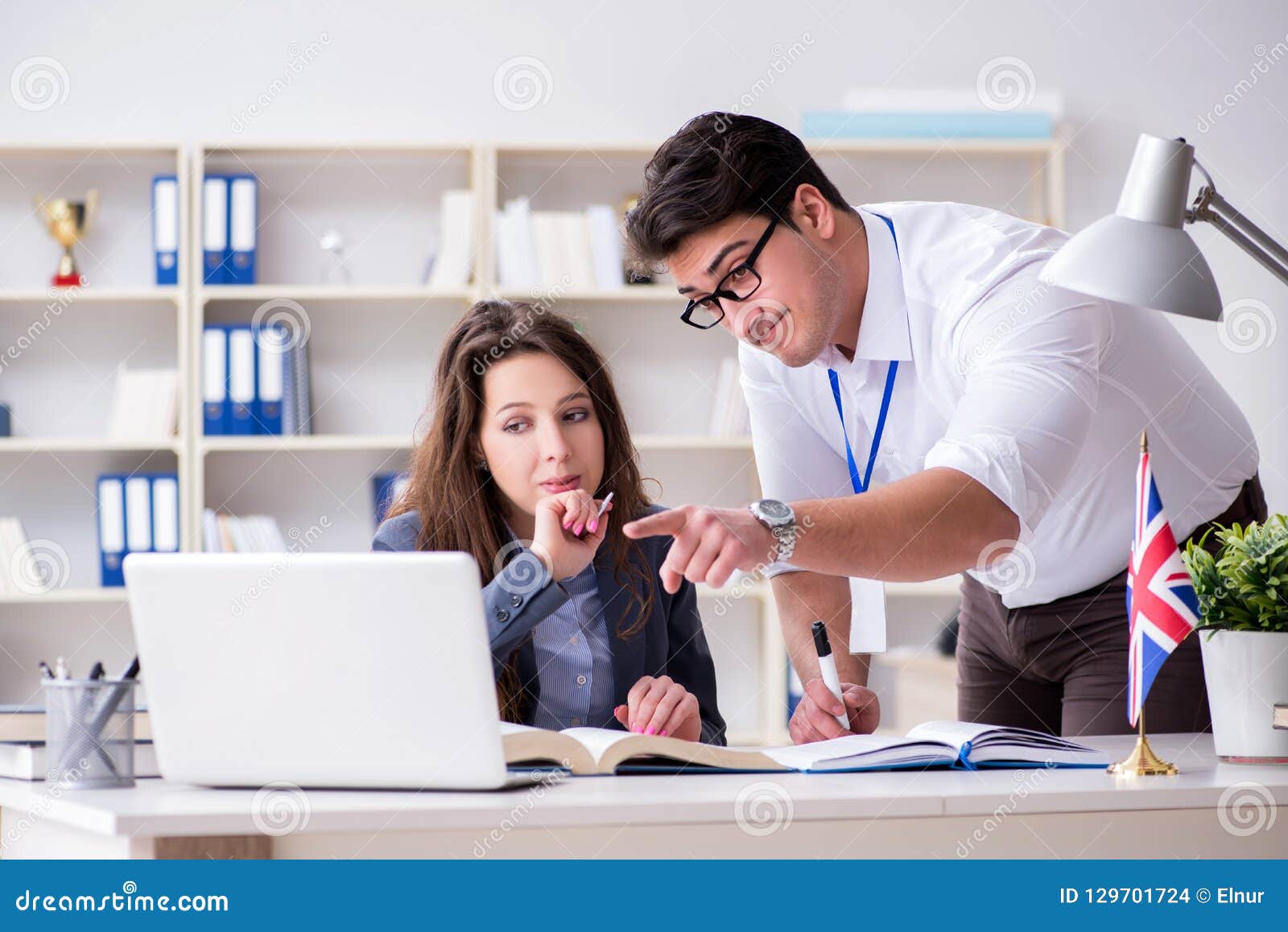 The Teacher Explaining To Student at Language Training Stock Photo ...