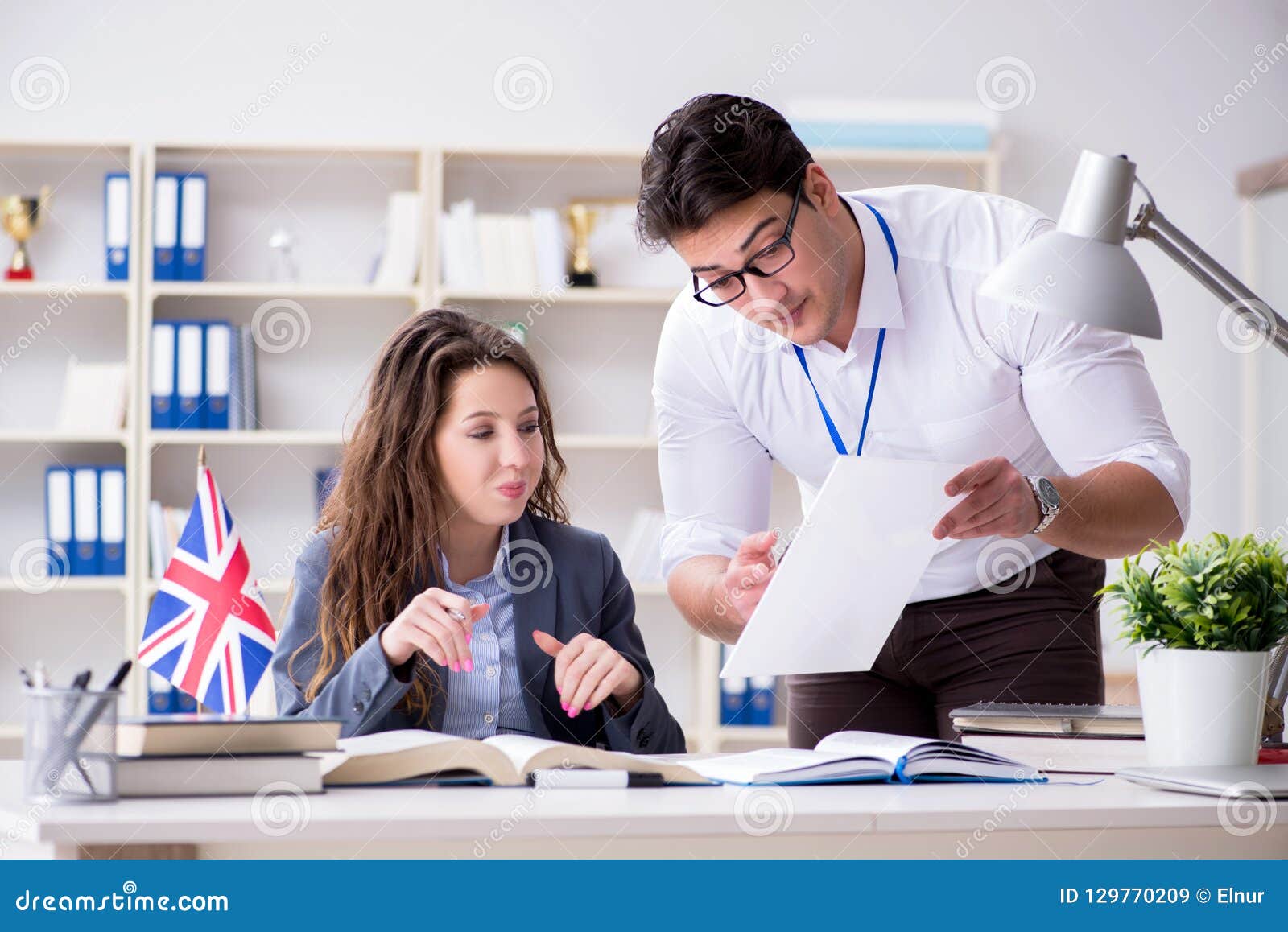 The Teacher Explaining To Student at Language Training Stock Image ...