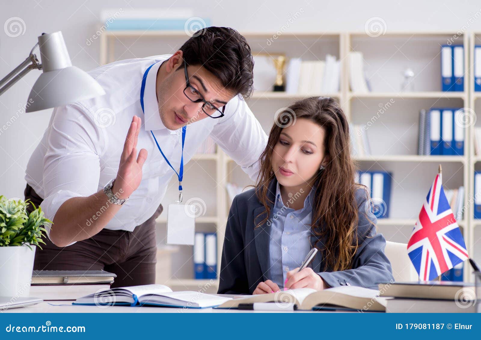 Teacher Explaining To Student at Language Training Stock Image - Image ...