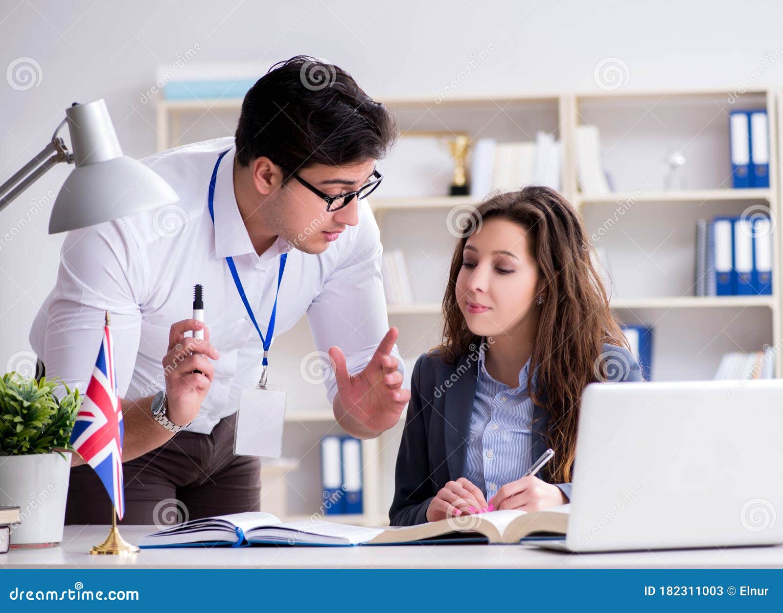 Teacher Explaining To Student at Language Training Stock Image - Image ...
