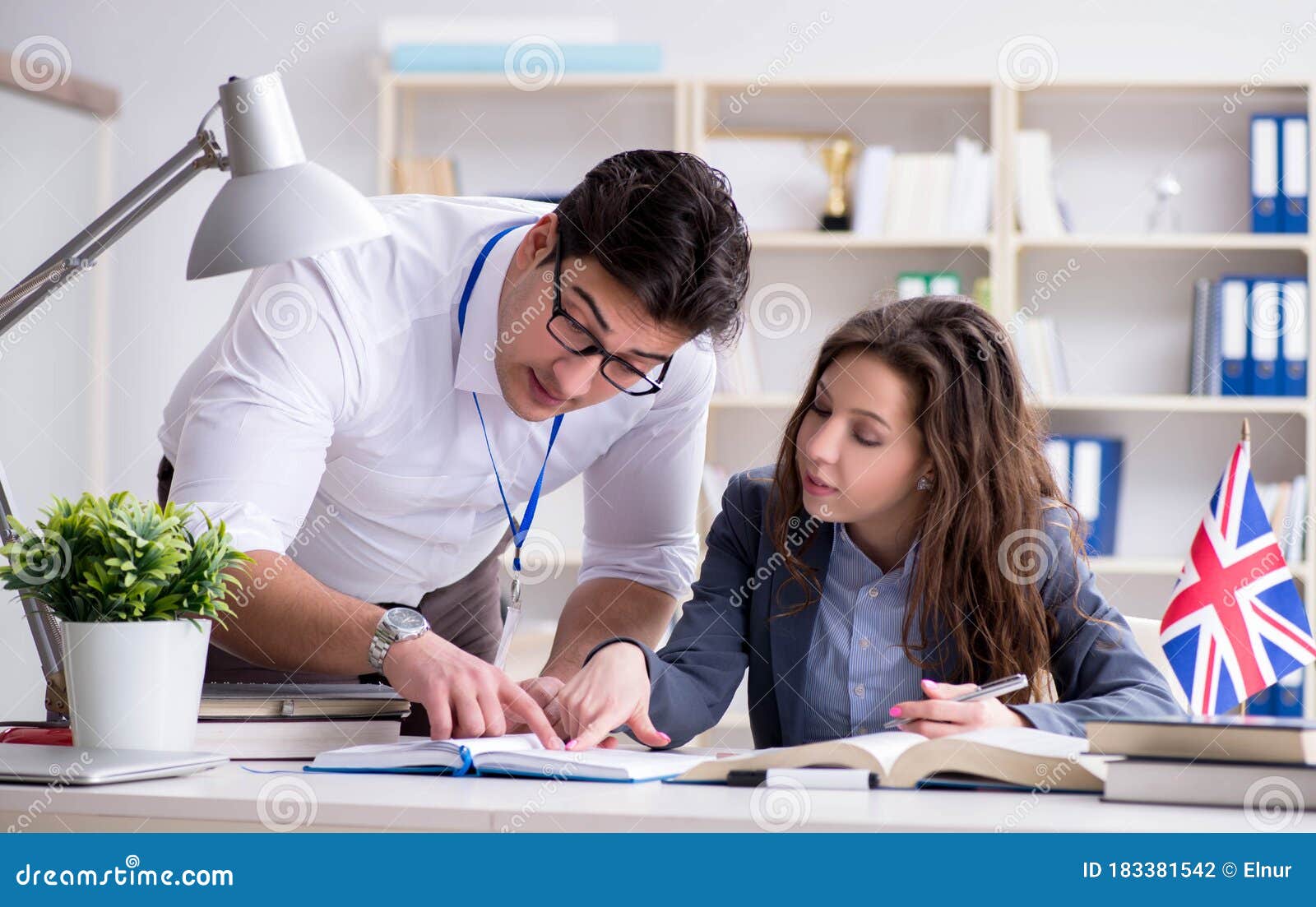 Teacher Explaining To Student at Language Training Stock Photo - Image ...