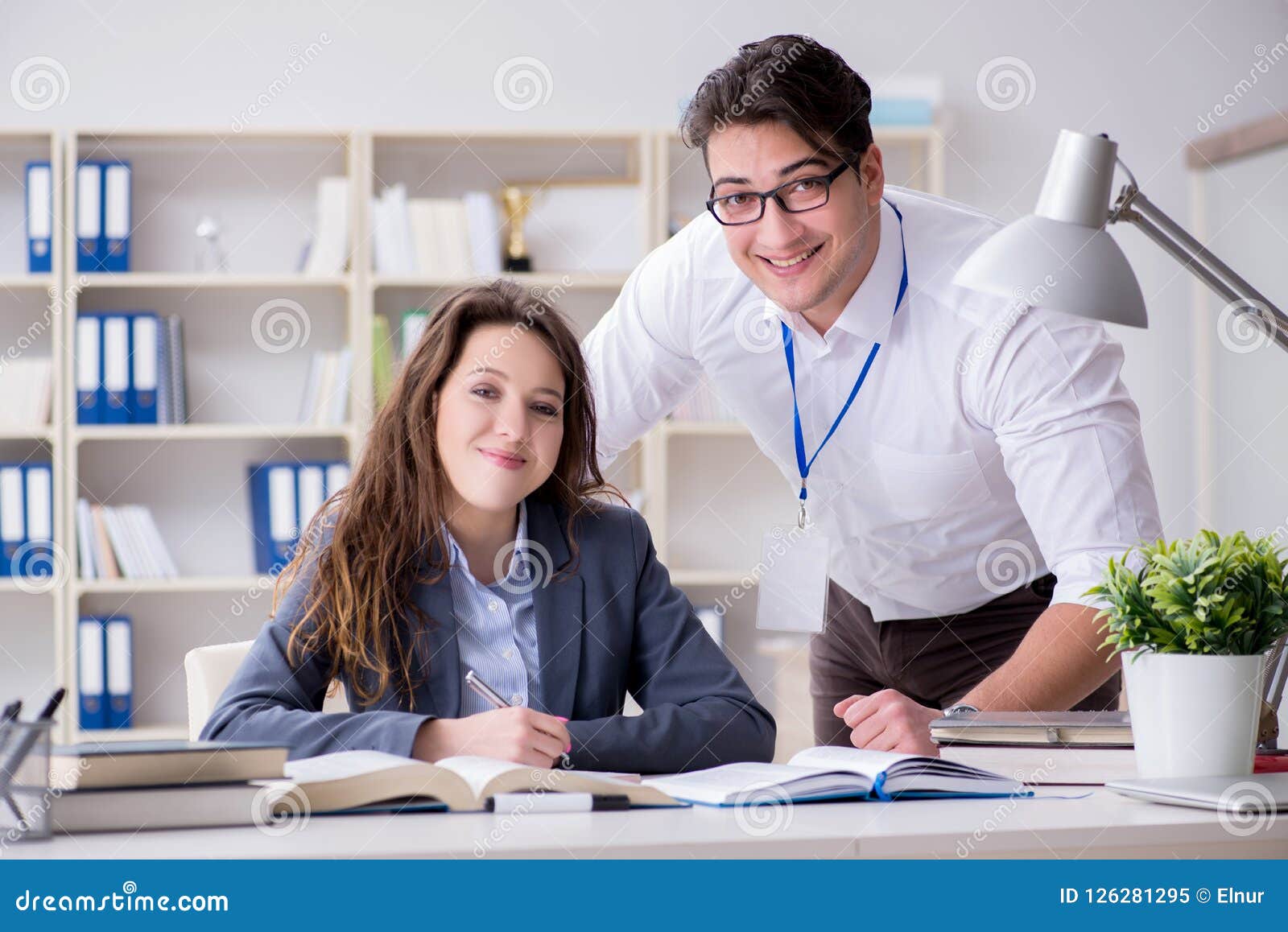The Teacher Explaining To Student at Lecture Stock Image - Image of ...