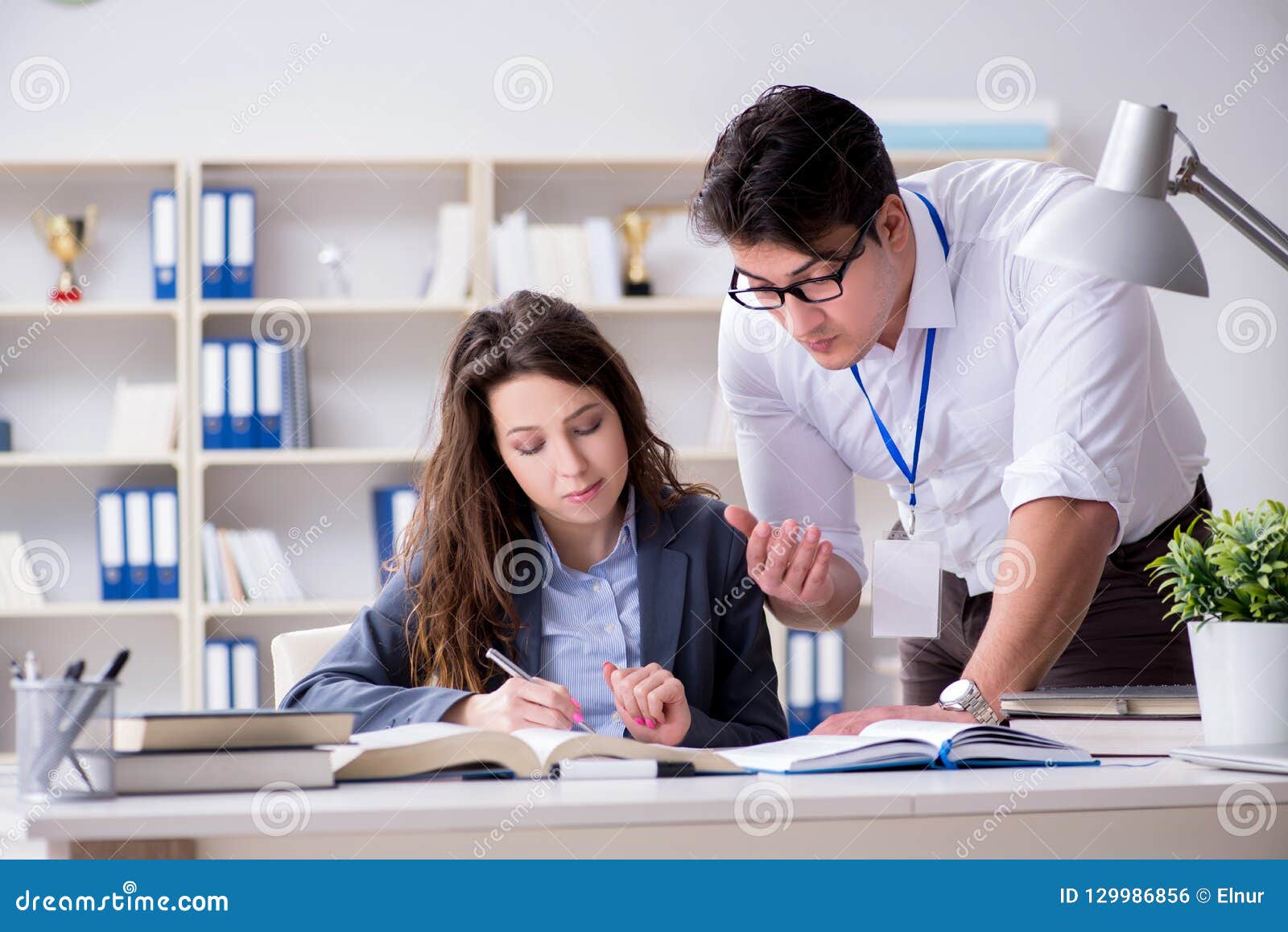 The Teacher Explaining To Student at Lecture Stock Photo - Image of ...